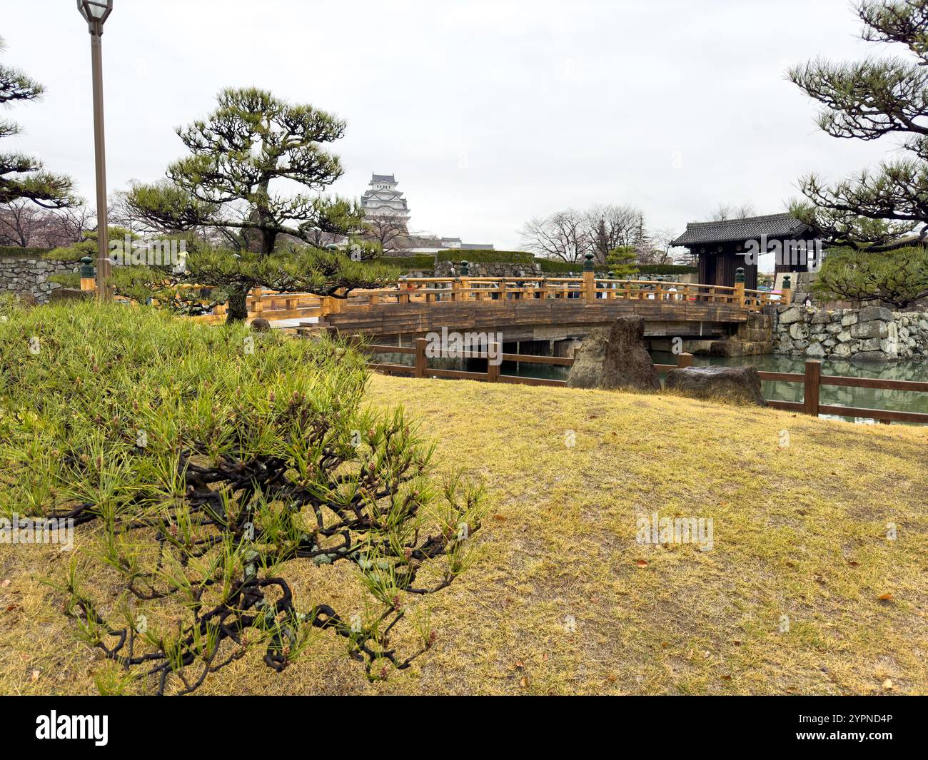 Himeji white Heron castle Japan, main keep. Sakuramon bridge at the ...