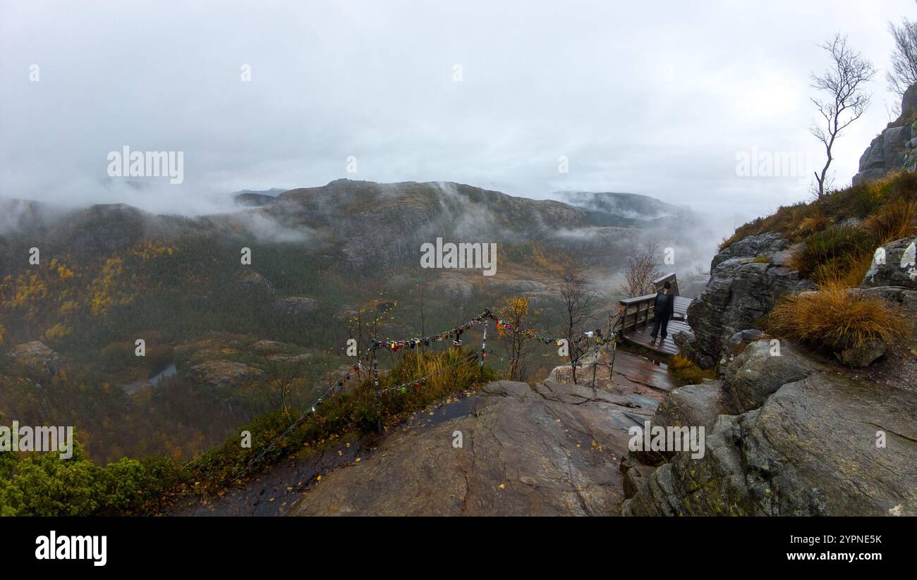 Misty outdoor scene with rocky terrain and vegetation hi-res stock ...