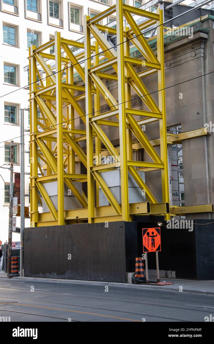 Heavy duty yellow scaffolding on Queen Street West in downtown Toronto ...