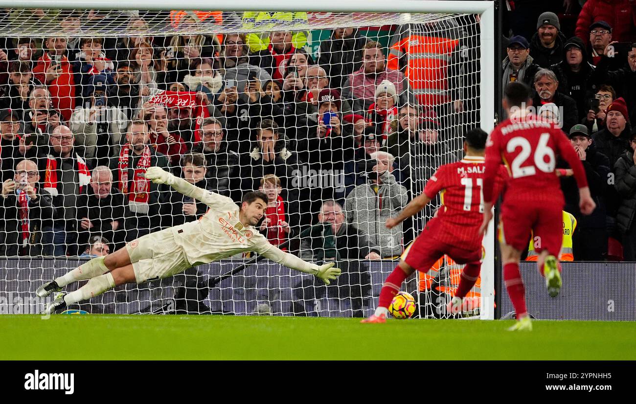 Liverpool's Mohamed Salah scores their side's second goal of the game ...
