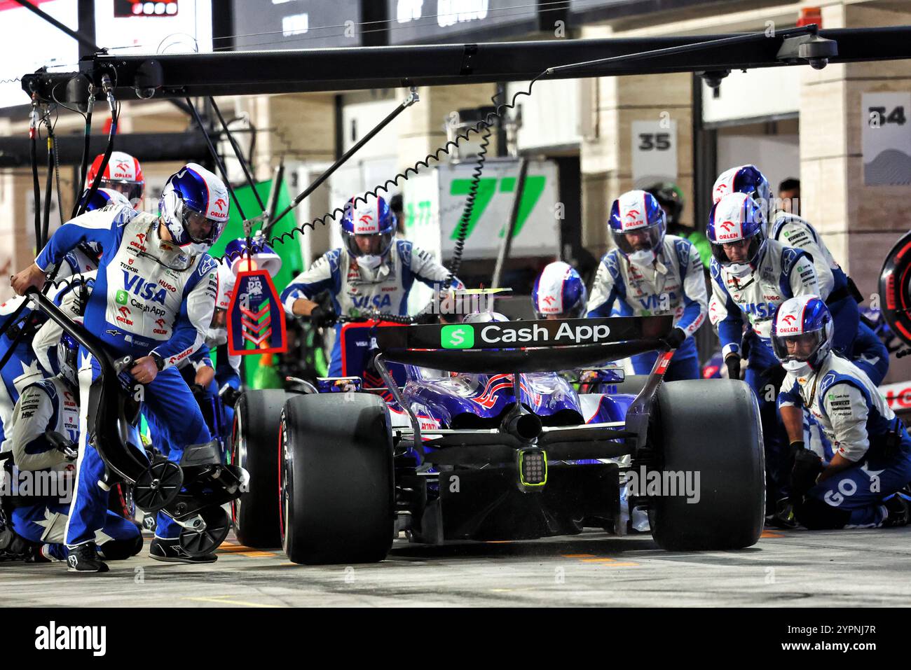 Yuki Tsunoda (JPN) RB VCARB 01 makes a pit stop. 01.12.2024. Formula 1 ...