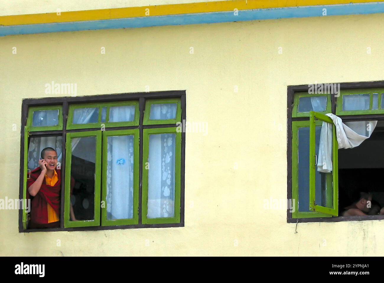Gangtok,Sikkim,India - 9th May 2008 : A monk talking on mobile phone at ...