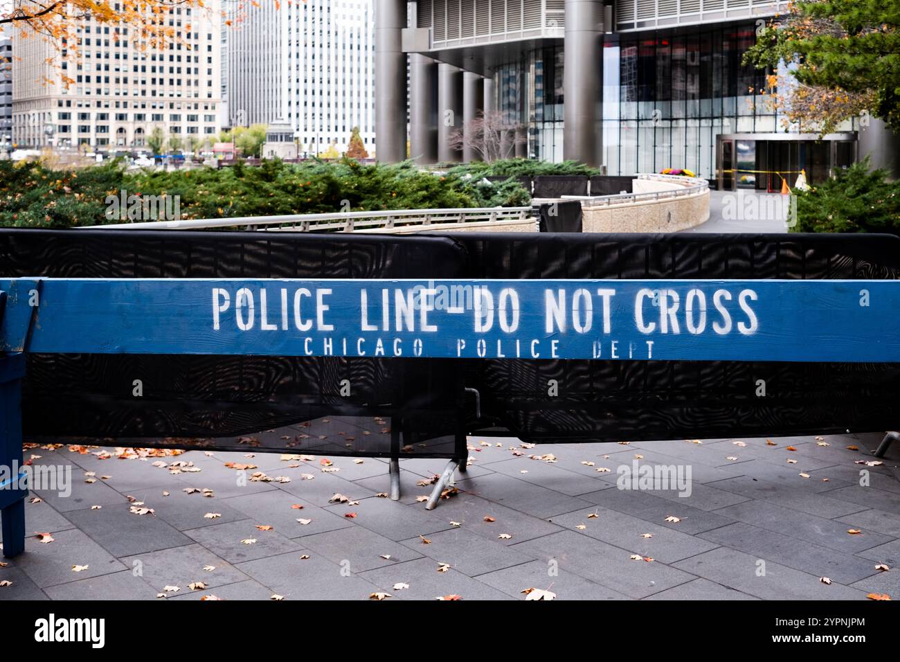 Police Line Do Not Cross sign on blue tape Stock Photo - Alamy