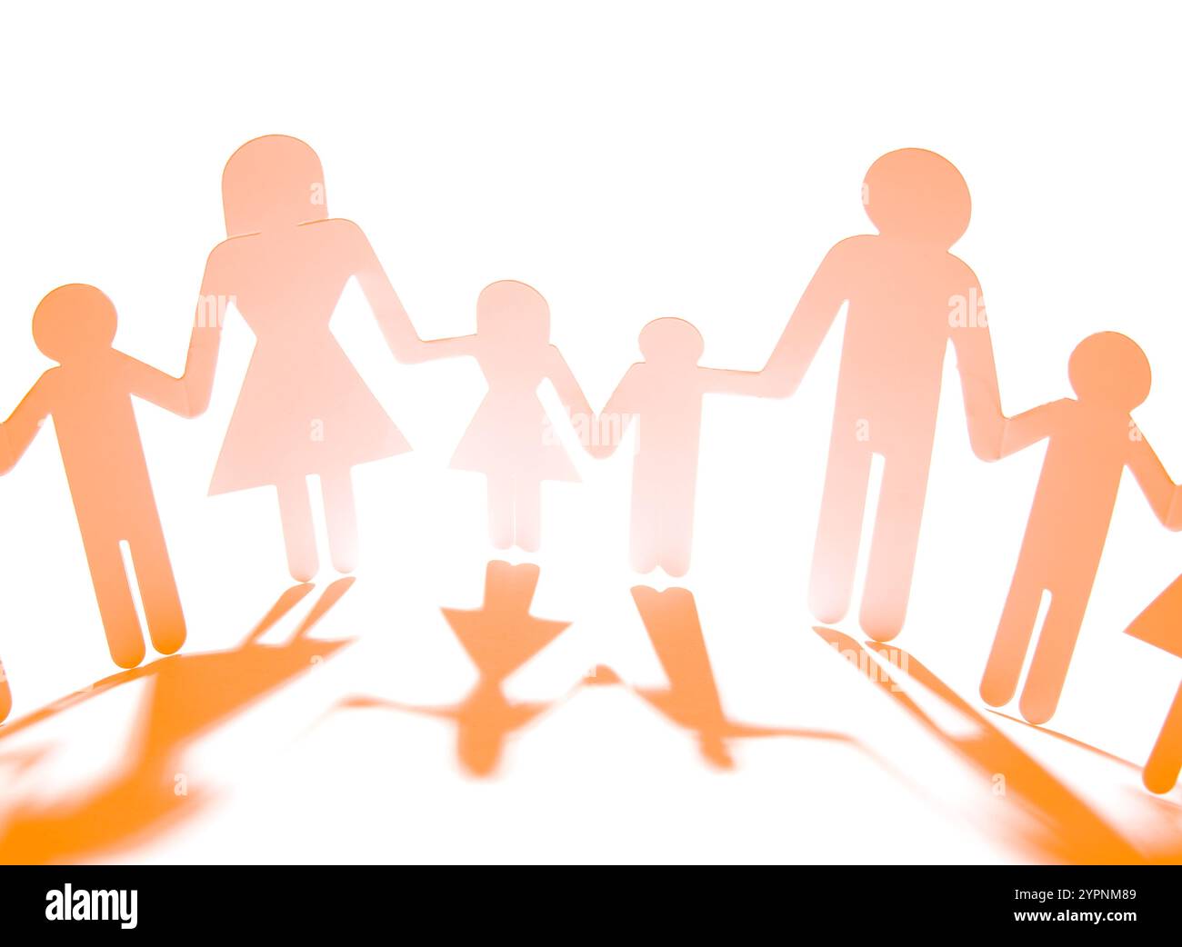 Family paper chain cutout holding hands Stock Photo - Alamy