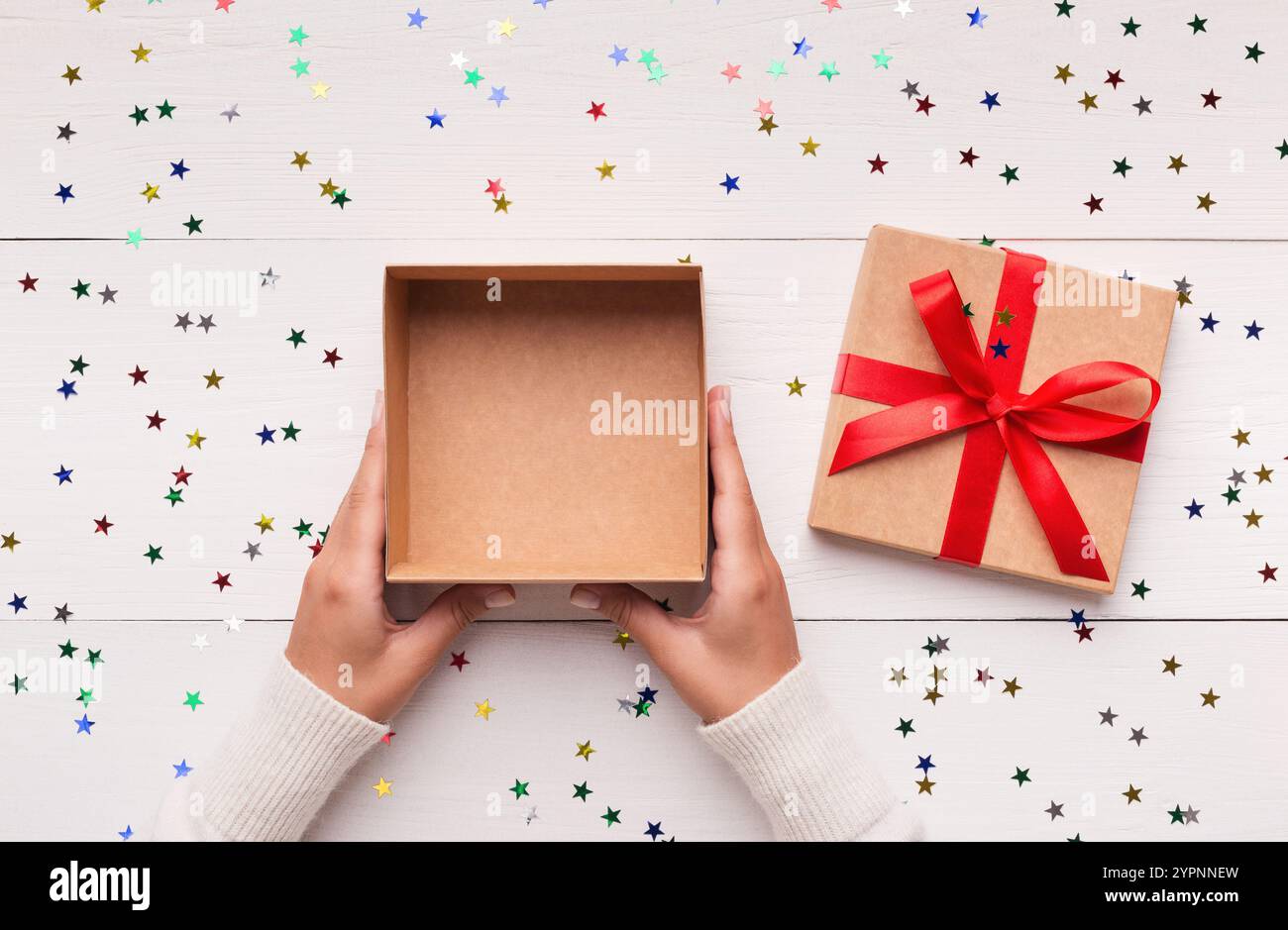 Female hands with open empty box on white background Stock Photo - Alamy