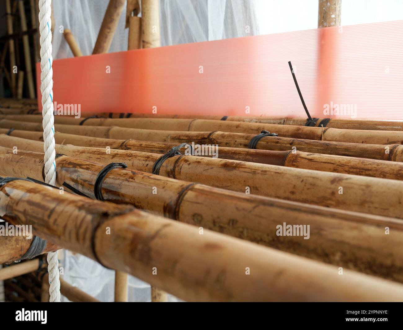 Close-up view of Bamboo scaffolding erected around a tower block in ...