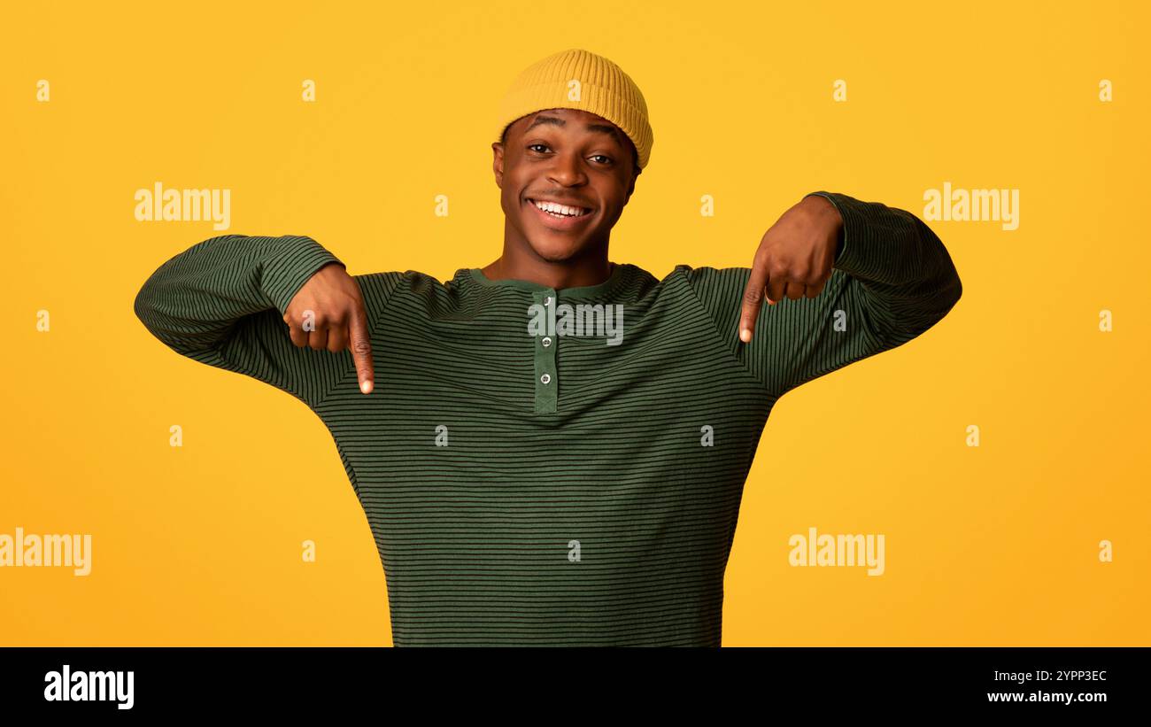 Look At This. Excited Black Guy Pointing Down With Two Hands Stock ...