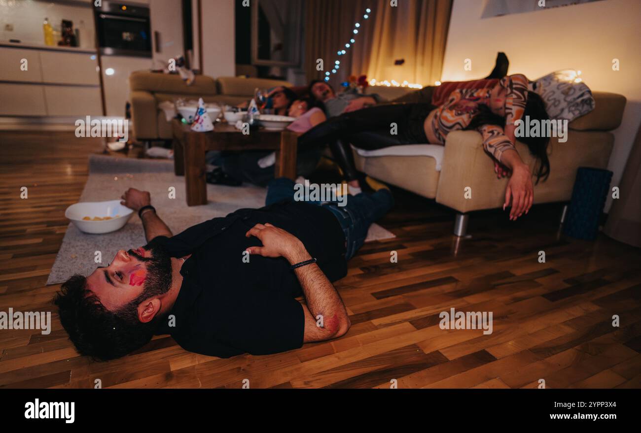 Group of friends exhausted after a lively birthday celebration Stock ...