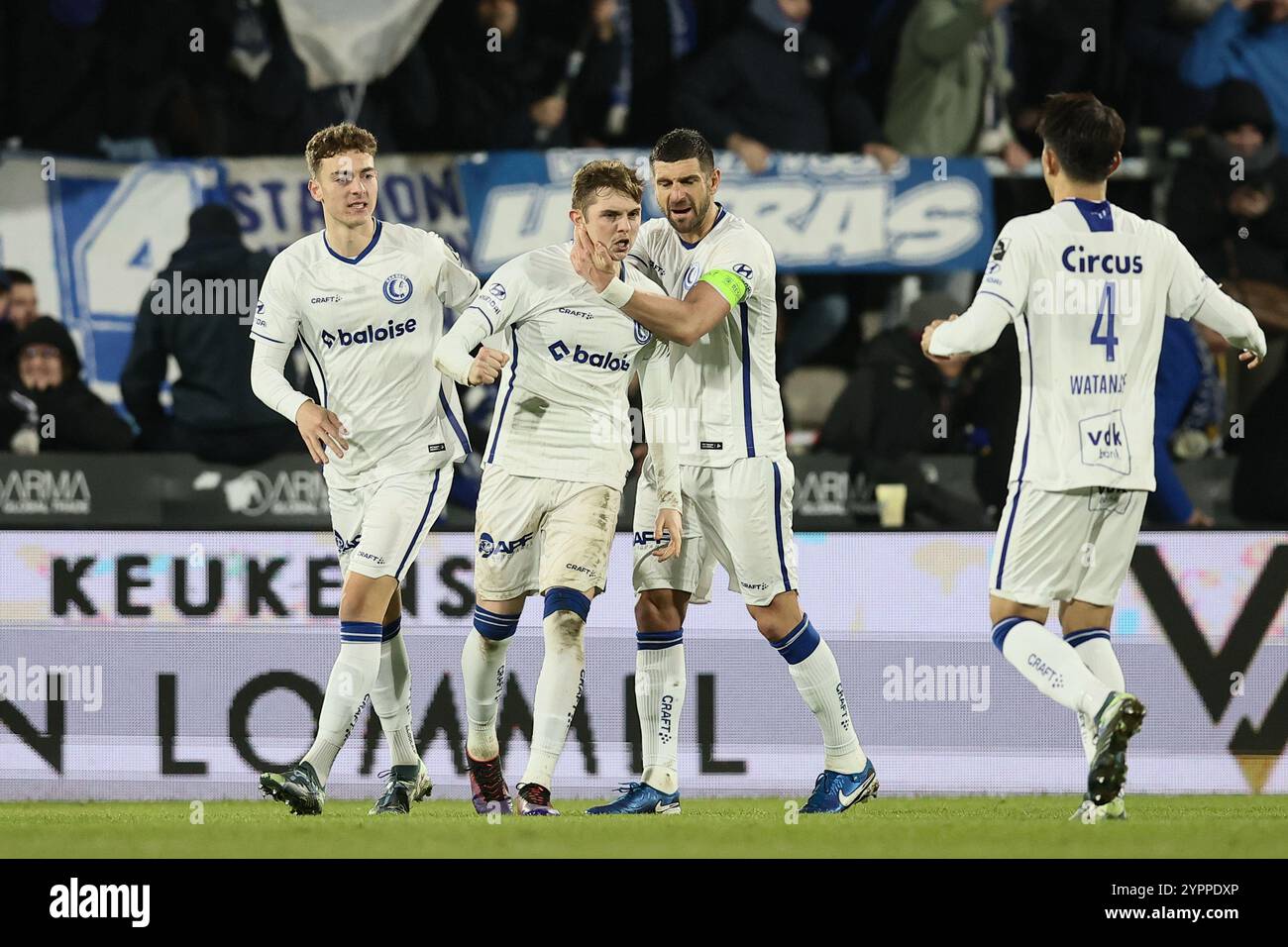 Westerlo, Belgium. 01st Dec, 2024. Gent's Max Dean celebrates after ...
