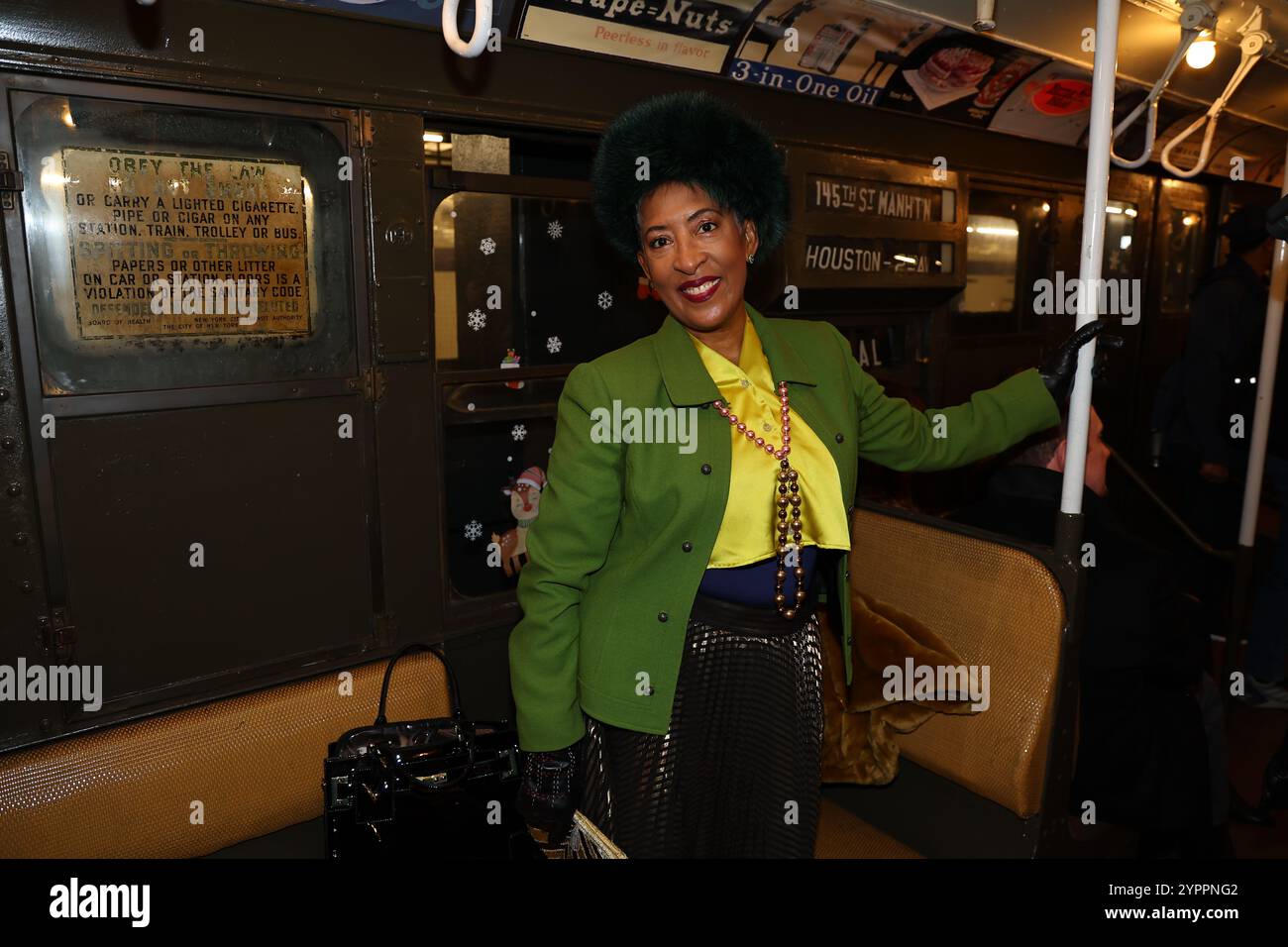 Cosplayers pose for a photo in the Holiday Nostalgia Rides hosted by ...