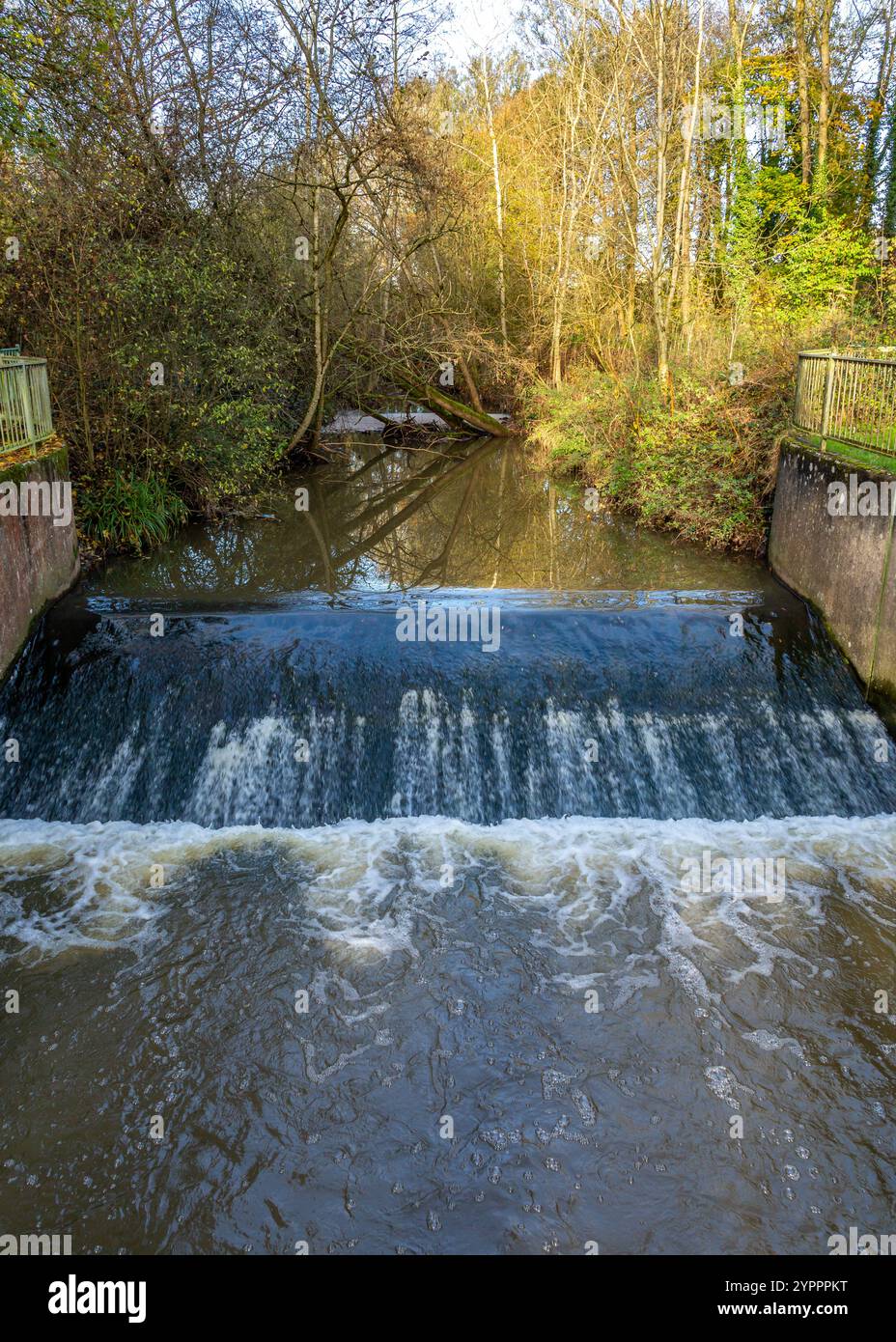 Fast flowing water in a woodland weir in Arrow Valley Park Stock Photo ...