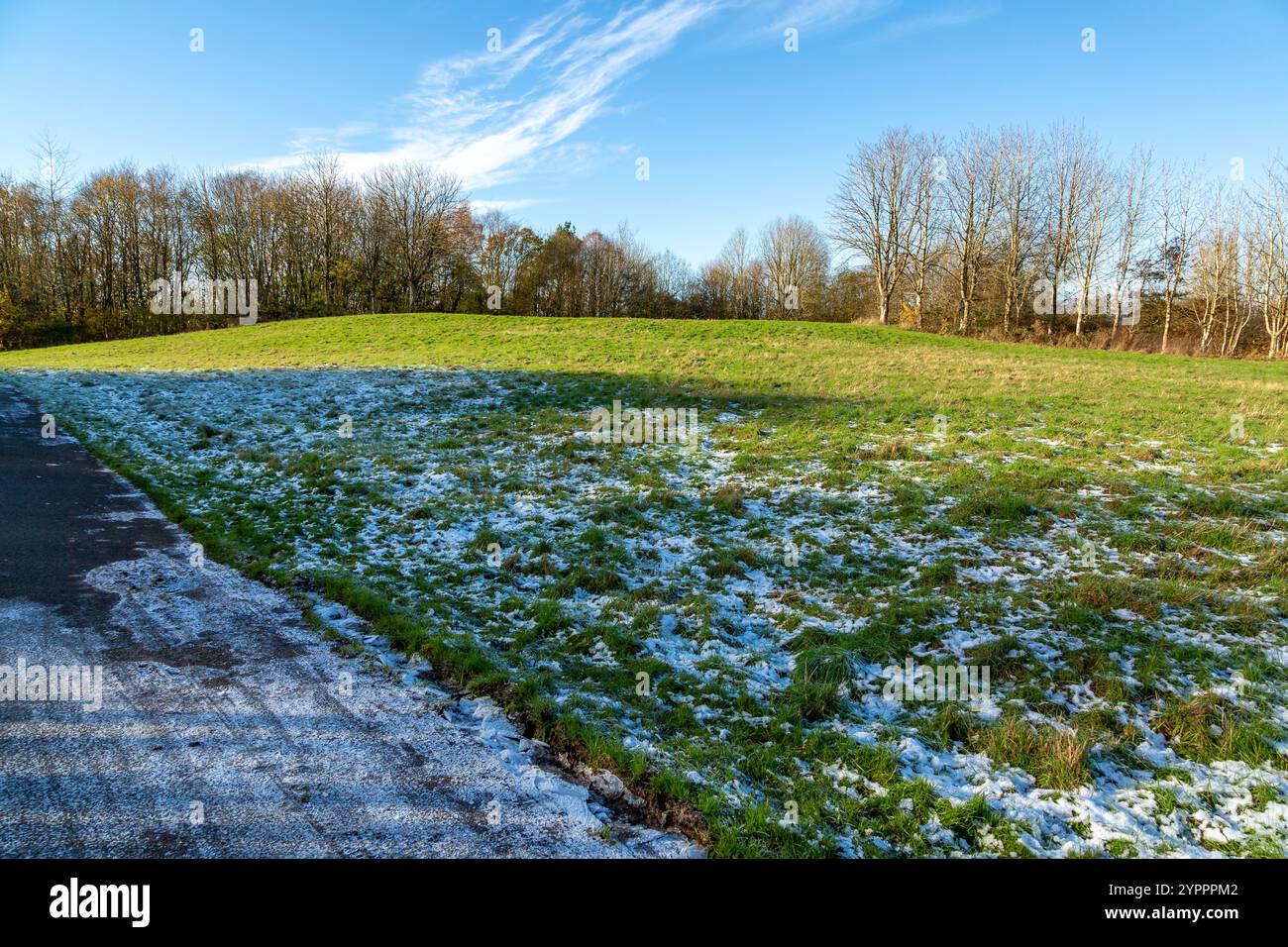 Icy conditions in a public park with frozen footpaths Stock Photo - Alamy