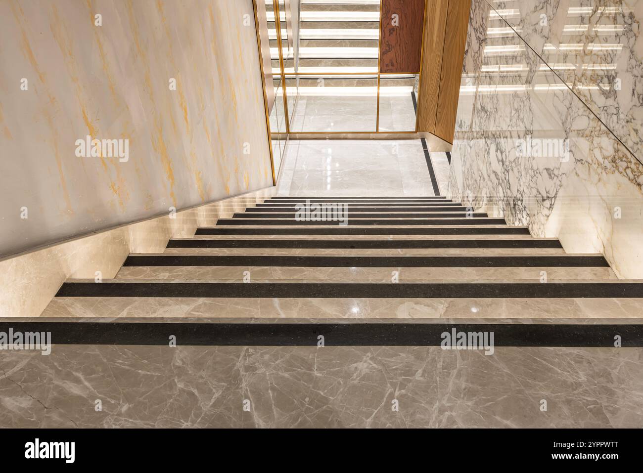 Modern staircase in luxury and spacious apartment. Modern wooden stairs ...