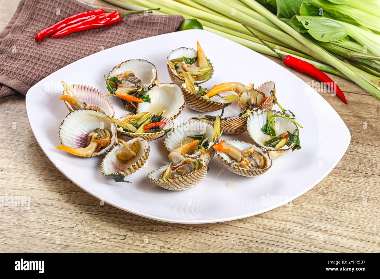 Delicous Asian mollusk shell steamed with spices Stock Photo - Alamy