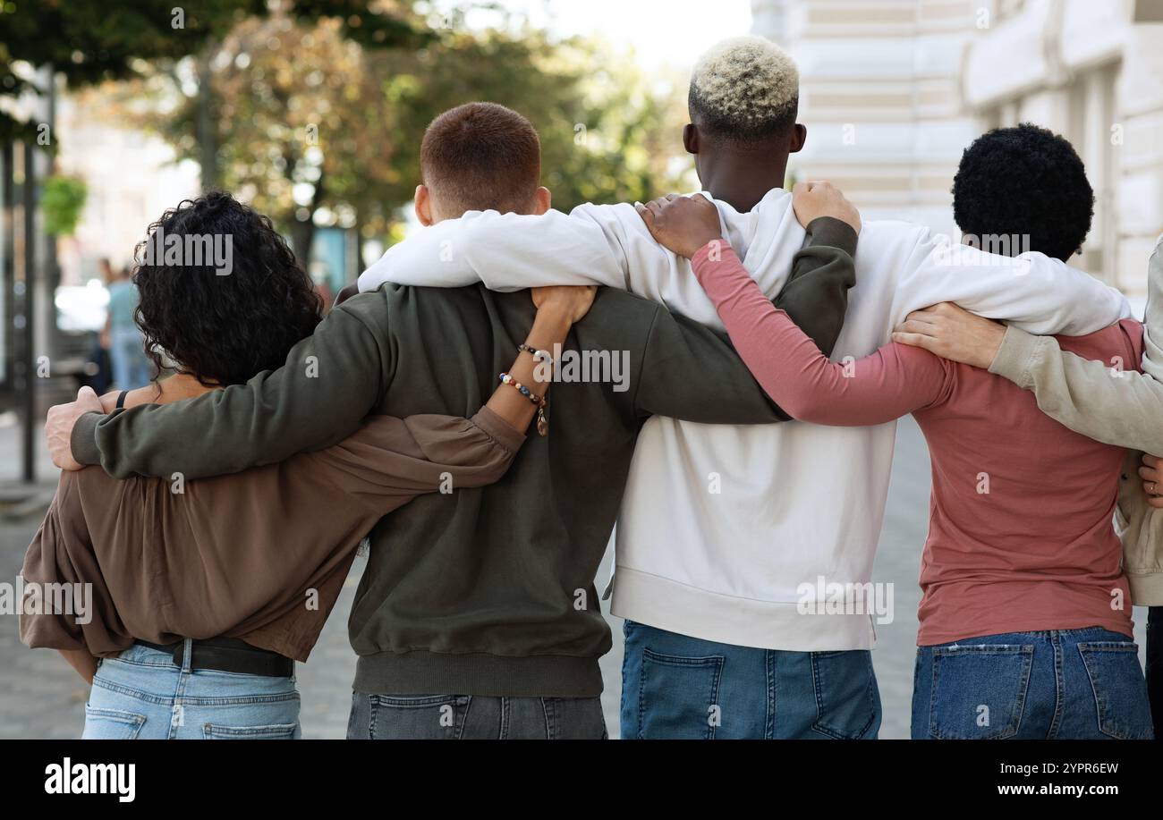 Back view of people making strike on the street, hugging Stock Photo ...