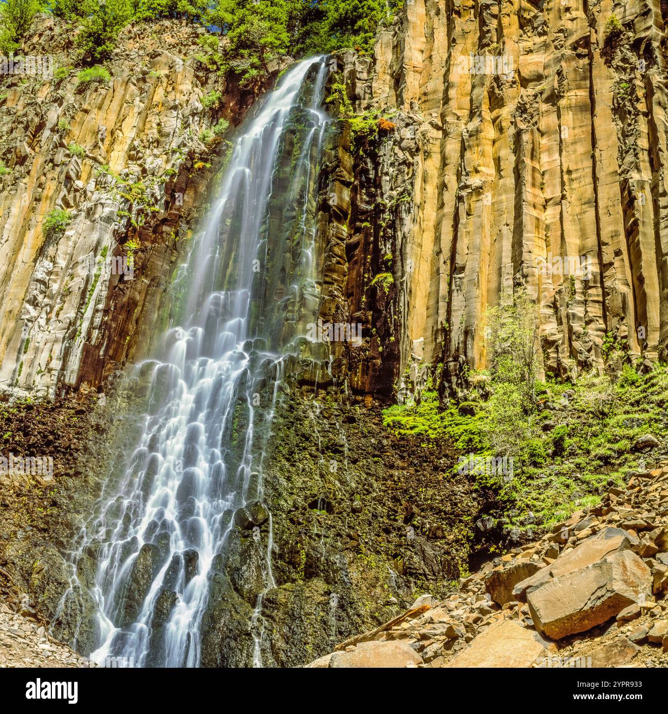 palisade falls spilling over columnar basalt in the east fork hyalite ...