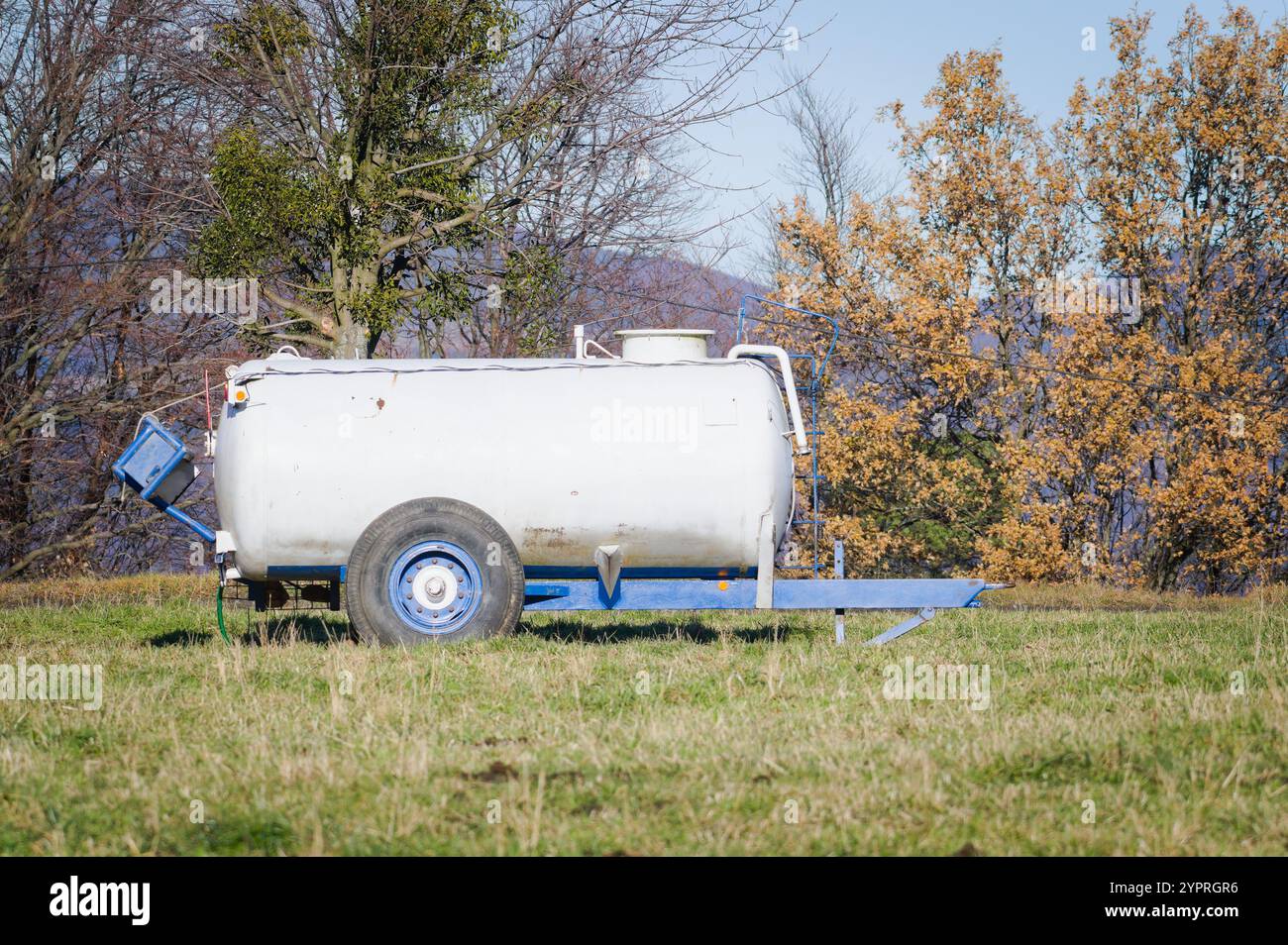 Livestock watering tank on the pasture. Watering place for cows Stock ...