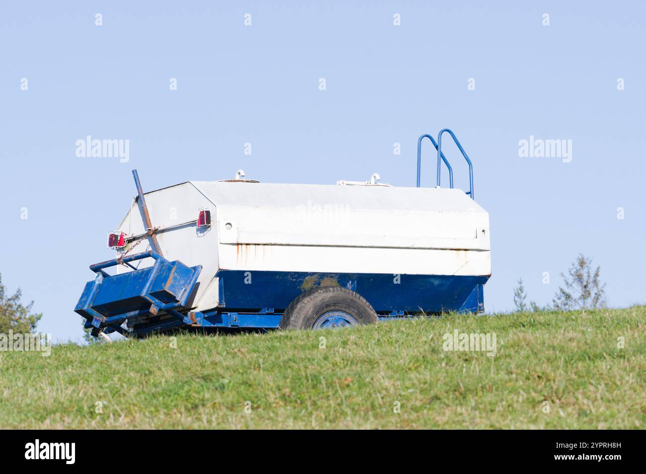 Livestock watering tank on the pasture. Watering place for cows Stock ...