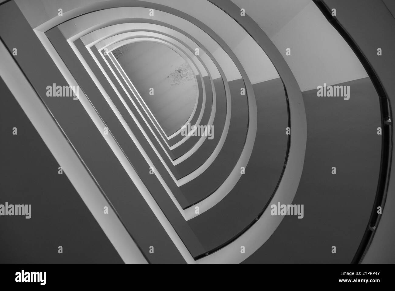 Black and white image showcasing abstract spiral staircase with ...