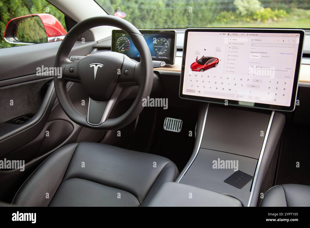 Vilnius, Lithuania - 16-08-2024 - Interior of Tesla Model 3, steering ...