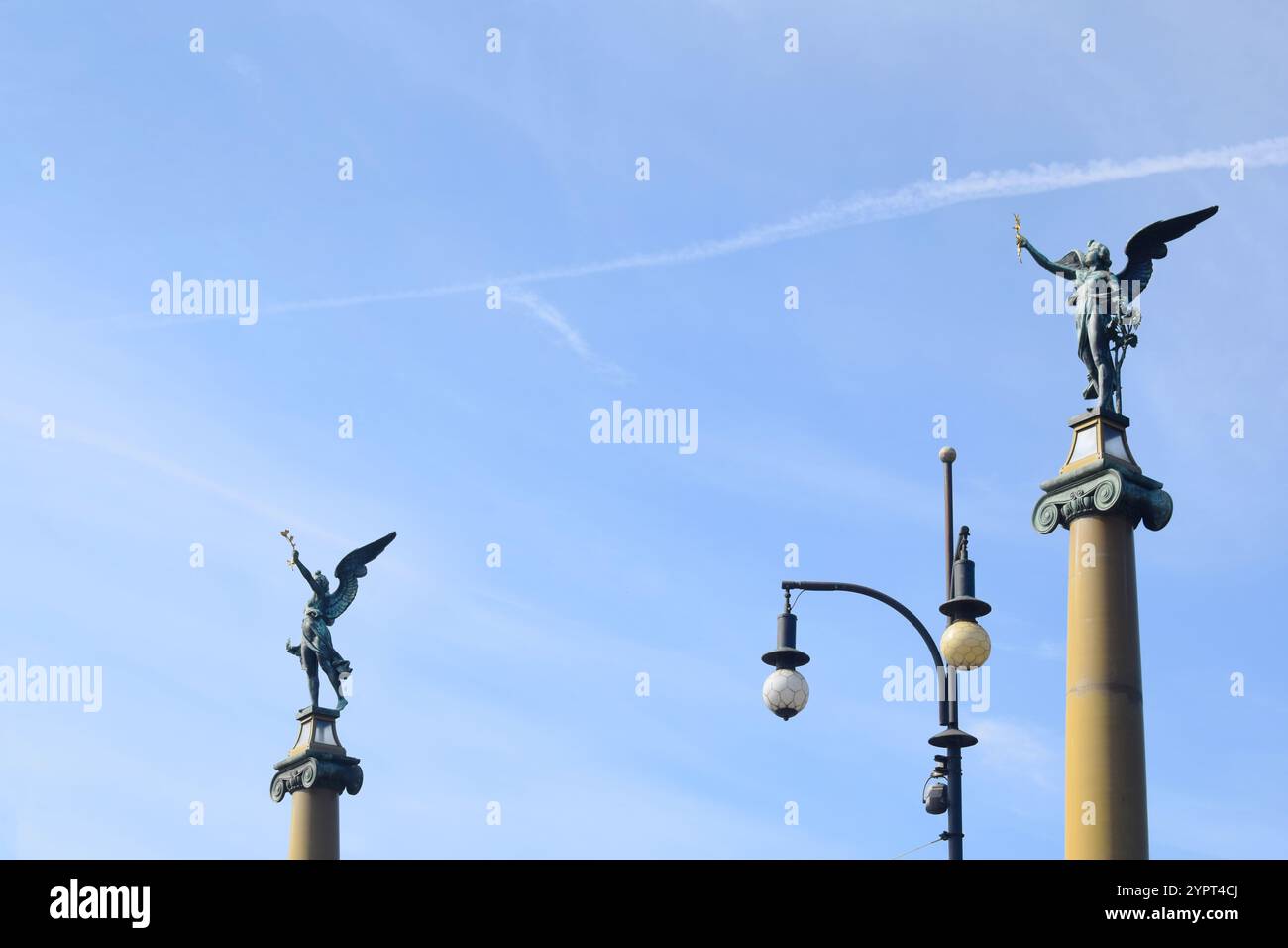 Angels on top of a column on the Czech Bridge (called Cechuv Most) in ...