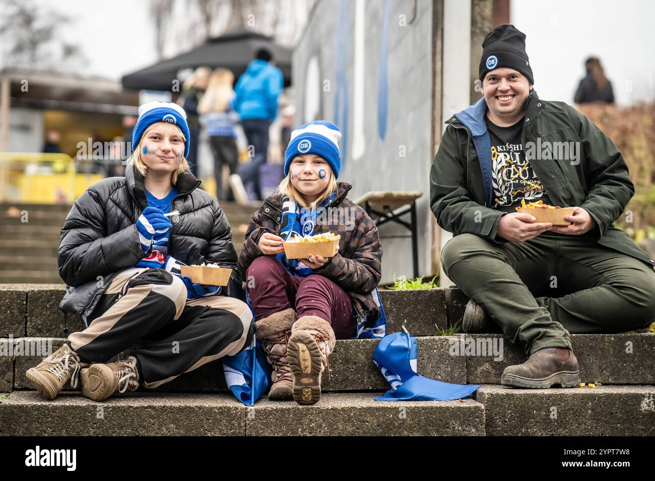 Odense, Denmark. 01st, December 2024. Football fans of Odense BK arrive ...