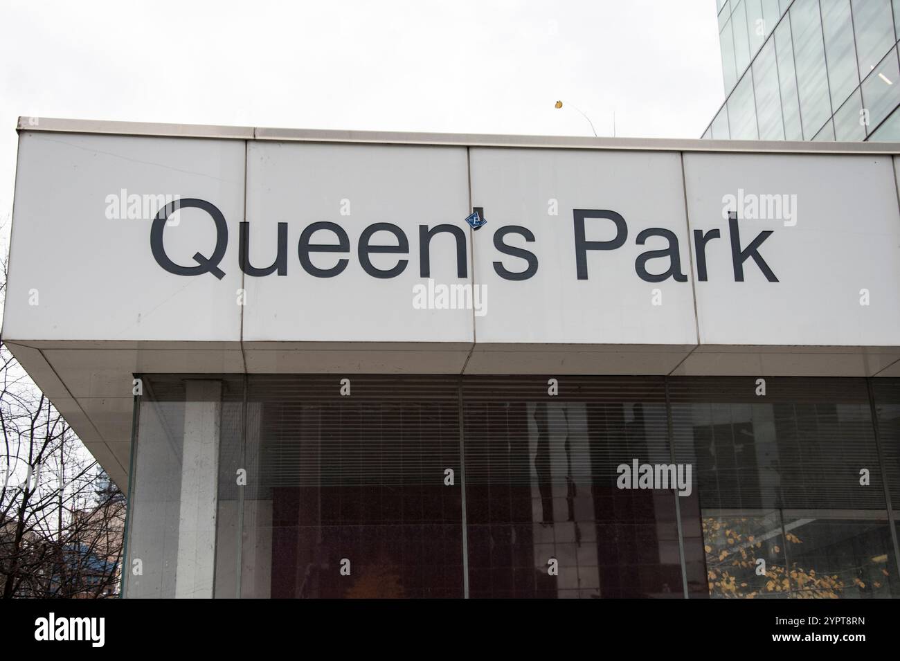 Queen's Park sign at the subway station on University Avenue in ...
