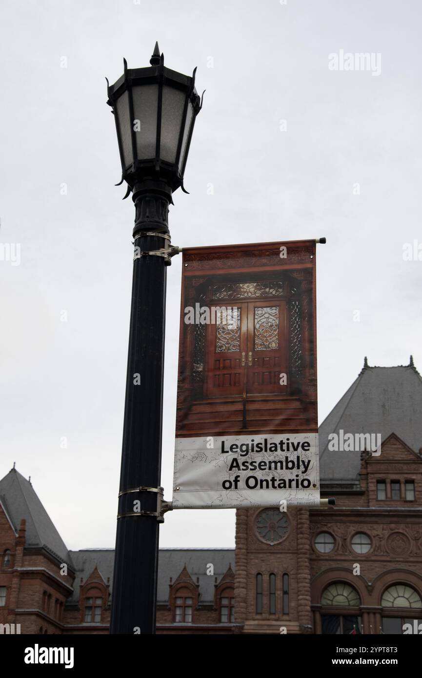 Banner of Legislative Assembly of Ontario wooden doors on Queen's Park ...
