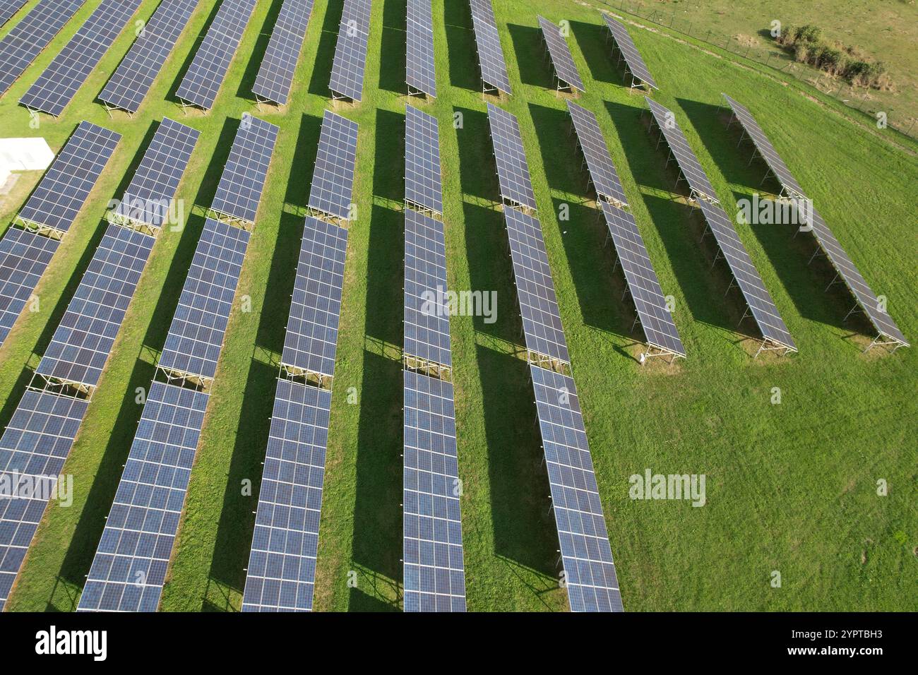 Aerial photo of solar power plant. Many solar energy panels in ...