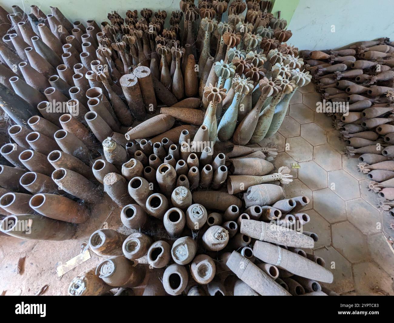 unexploded land mines and cluster bombs remains picked up all around ...