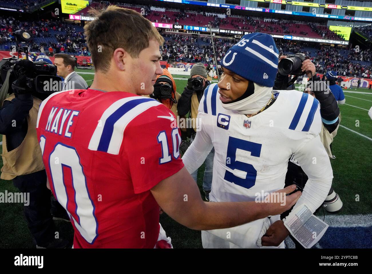 New England Patriots quarterback Drake Maye (10) talks with ...