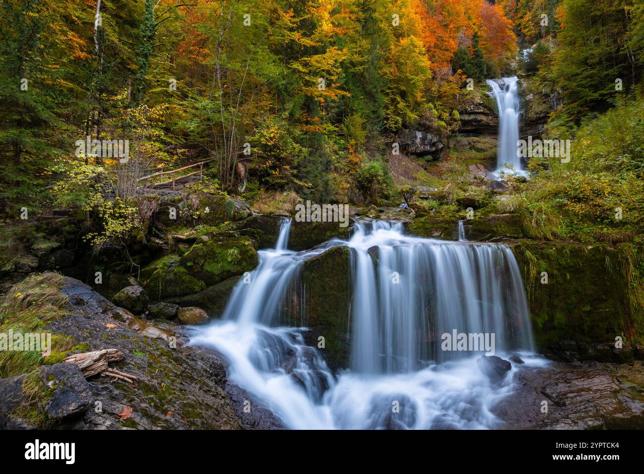 View of the Giessbach waterfalls in autumn. Iseltwald, Lake Brienz ...