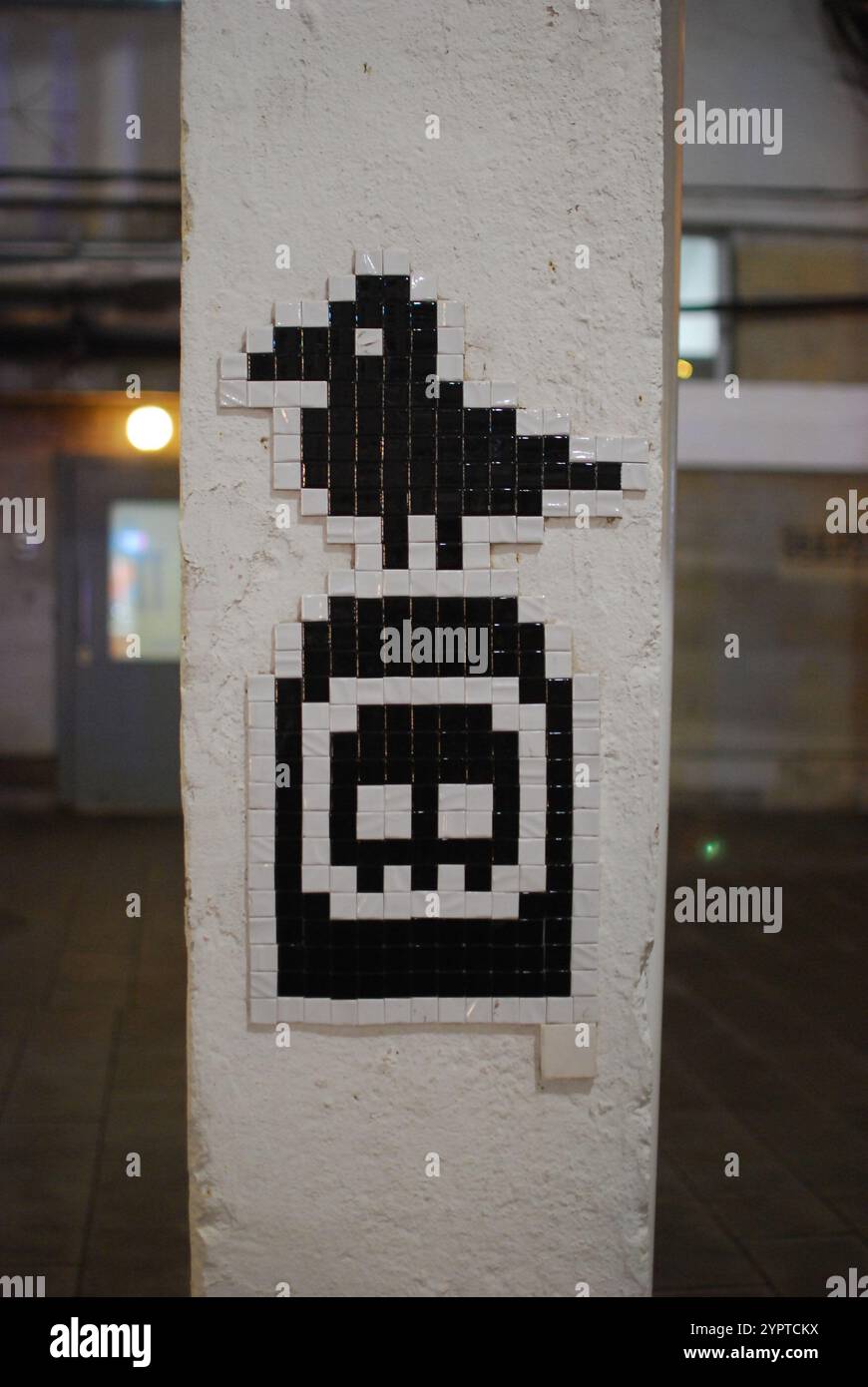 A Unique Pixel Art Mosaic Creating a Striking Contrast on an Urban Wall ...