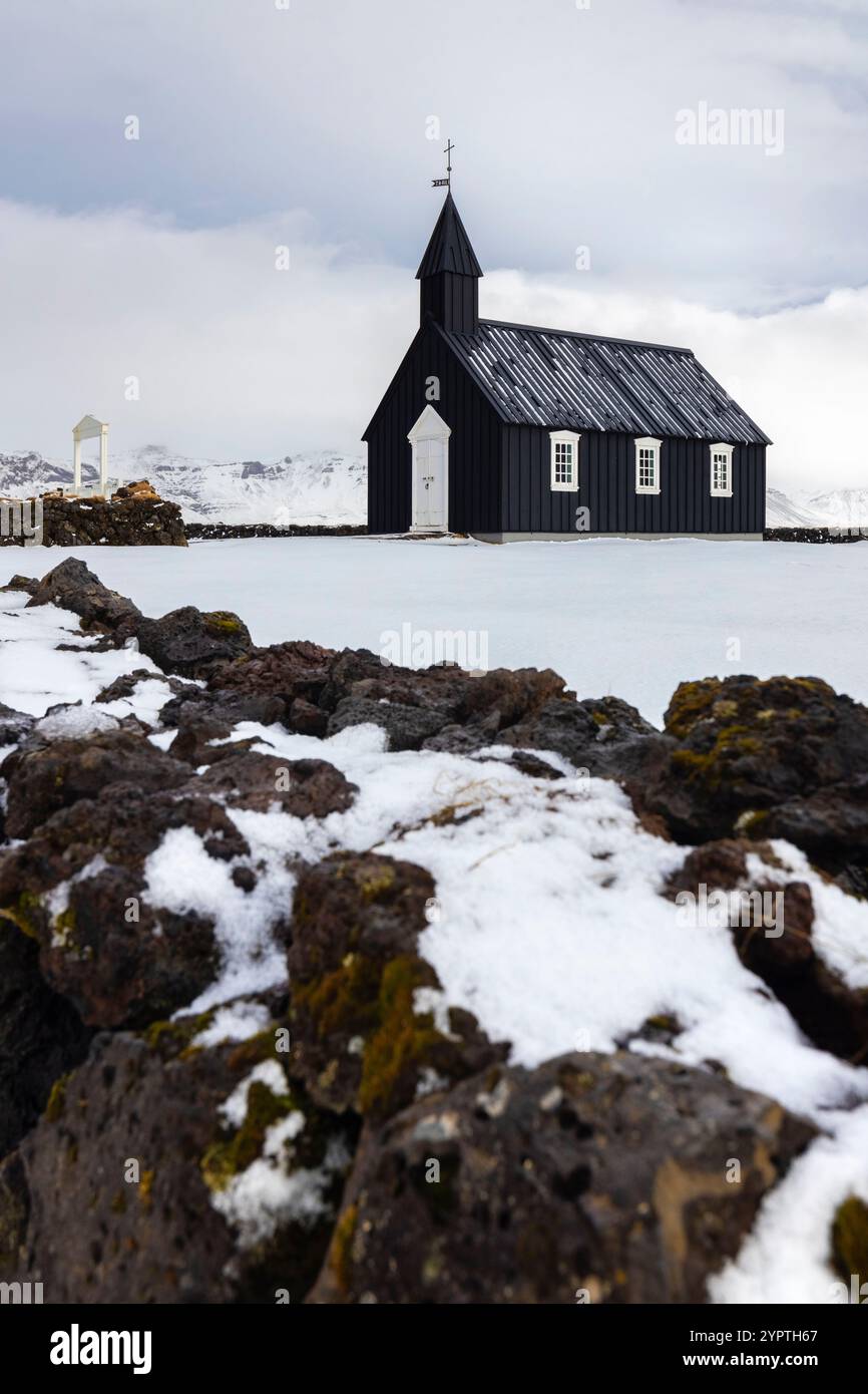 View of the famous black church of Budir in winter. Snaefellsnes ...