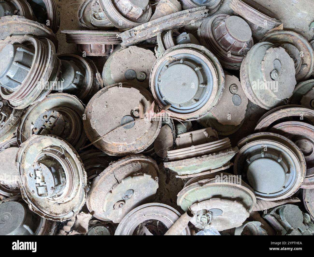 unexploded land mines and cluster bombs remains picked up all around ...