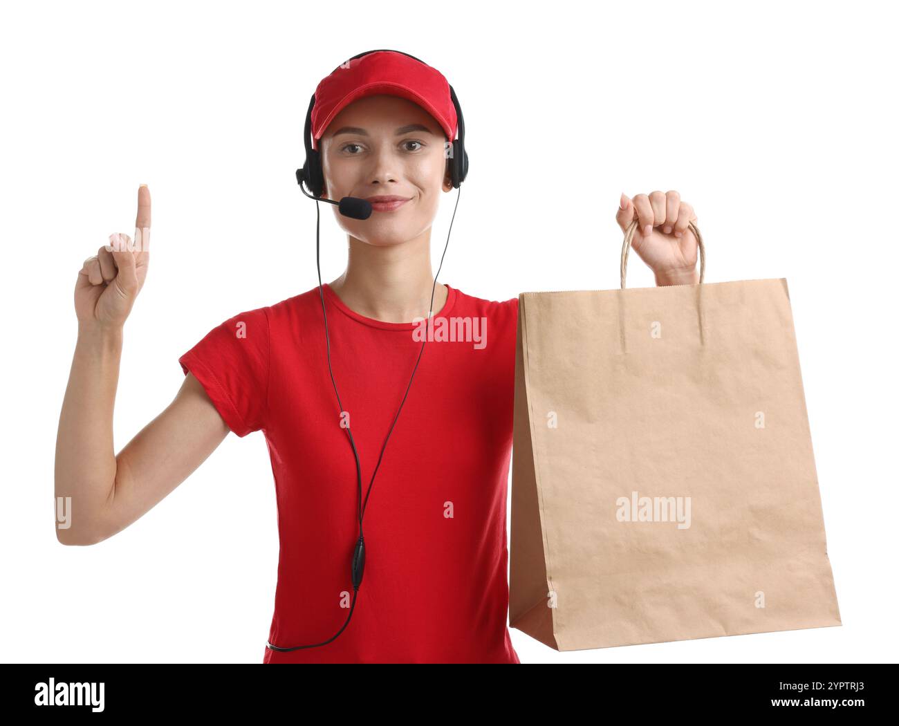 Fast-food worker with paper bag on white background Stock Photo - Alamy