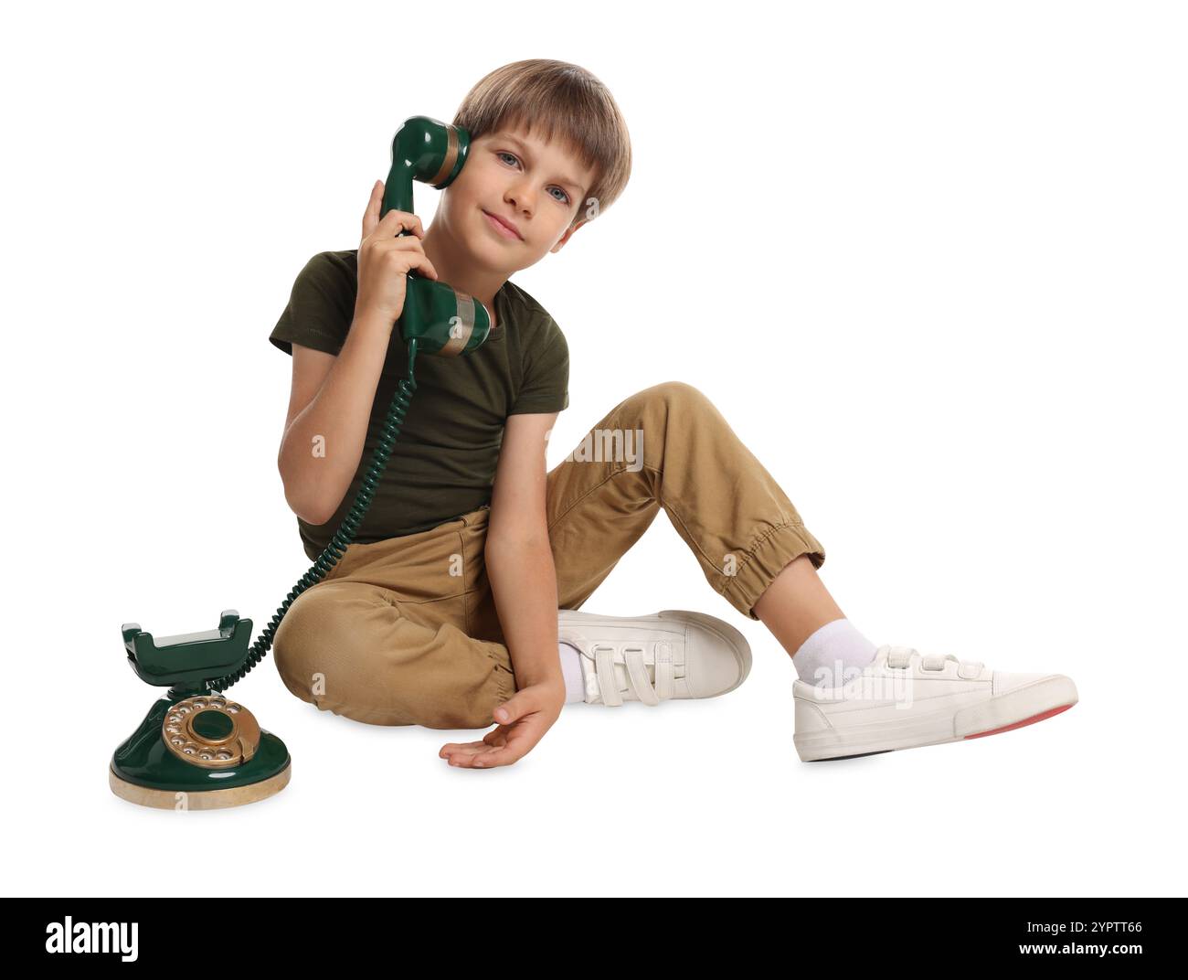 Cute little boy with vintage telephone on white background Stock Photo ...