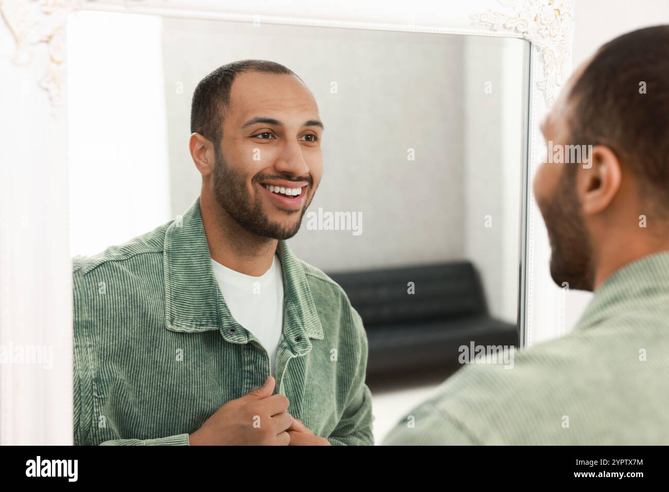 Elegant young man dressing hi-res stock photography and images - Alamy