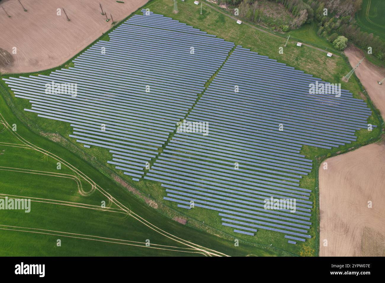 Aerial photo of solar power plant. Many solar energy panels in ...