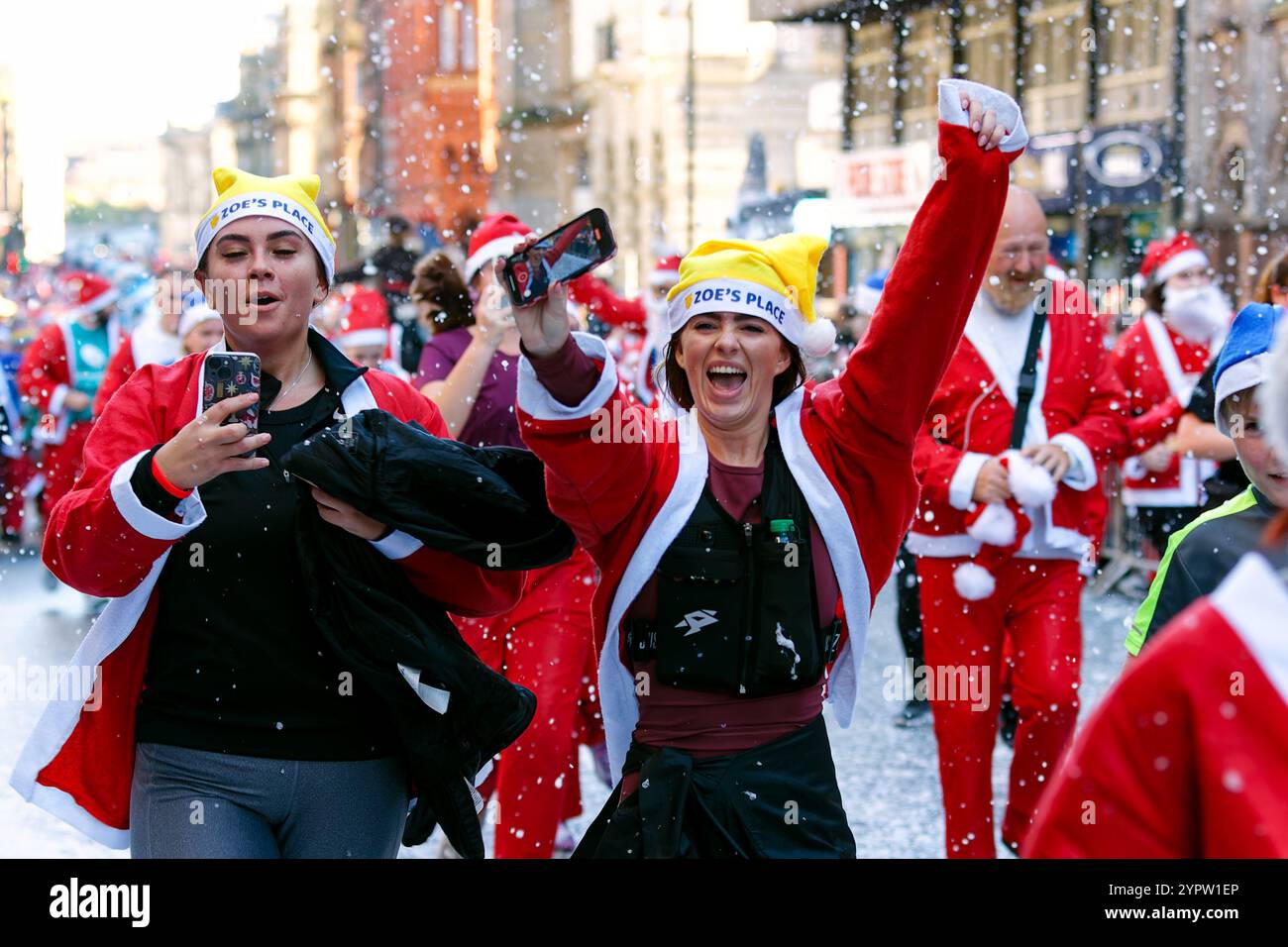 December 1, 2024, Liverpool, United Kingdom: Runners celebrate during ...