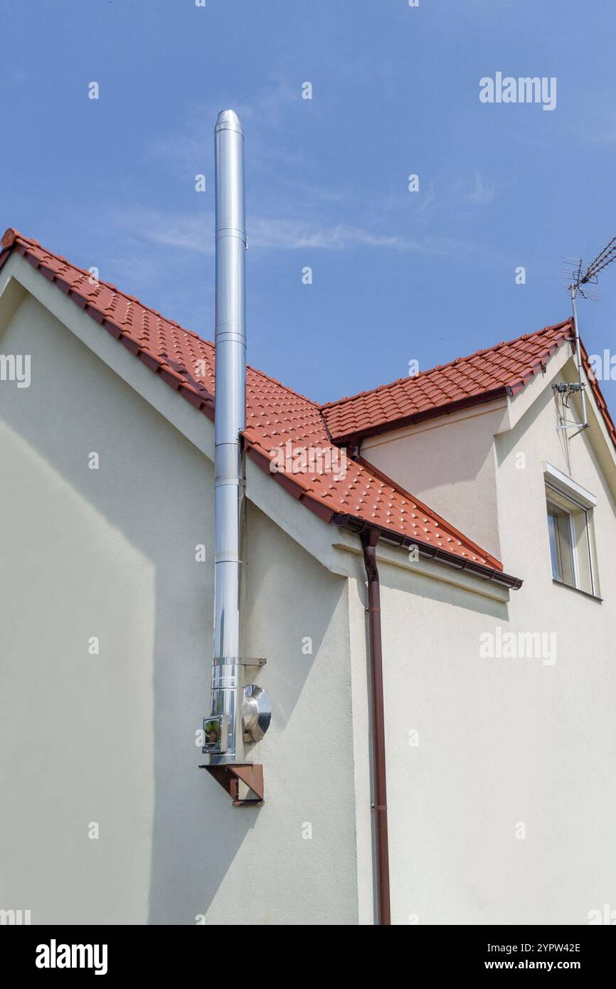 Modern Stainless Steel Chimney on Residential House Stock Photo - Alamy