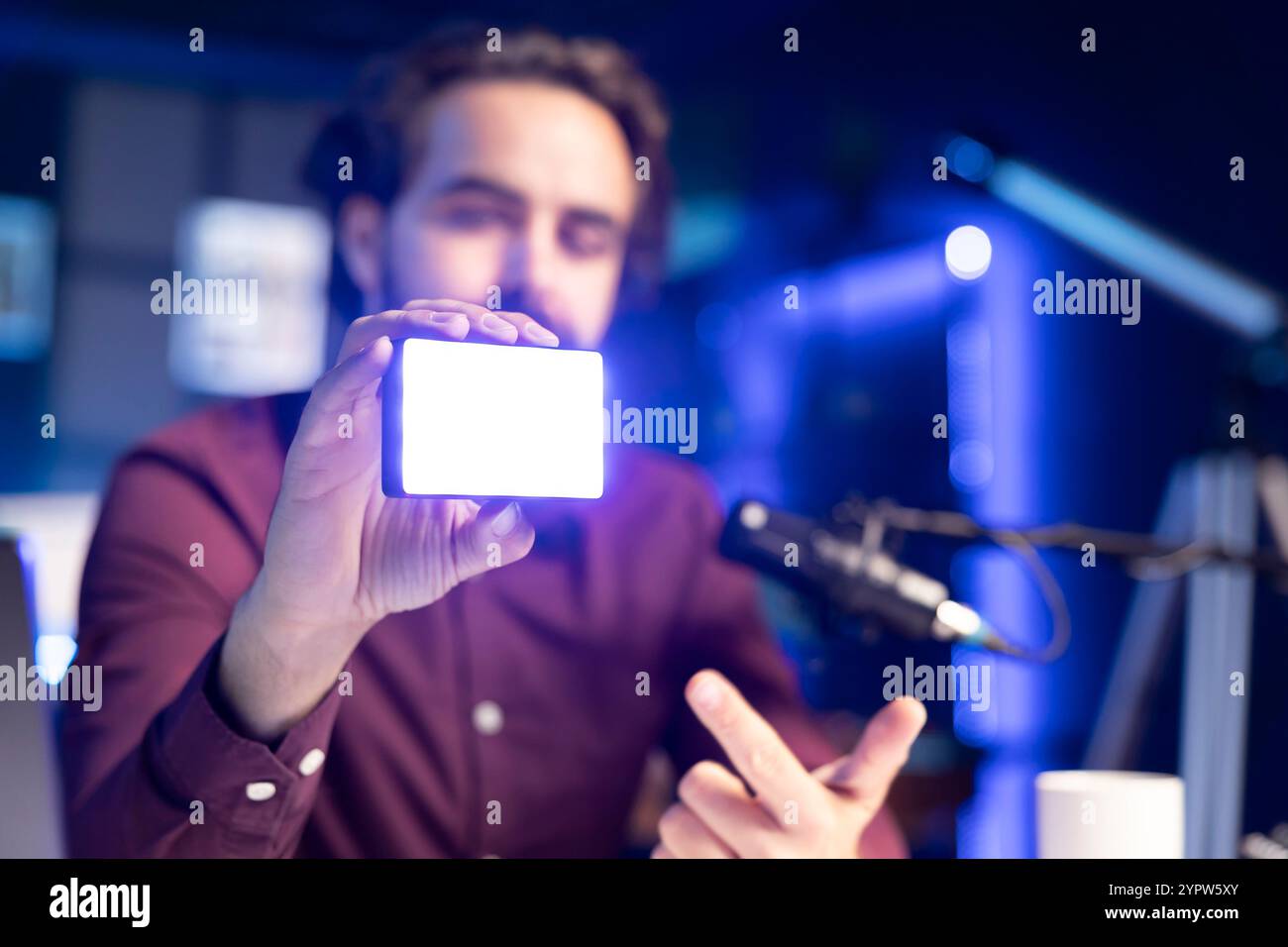 Close up shot of mini led lights reviewed by influencer in studio ...