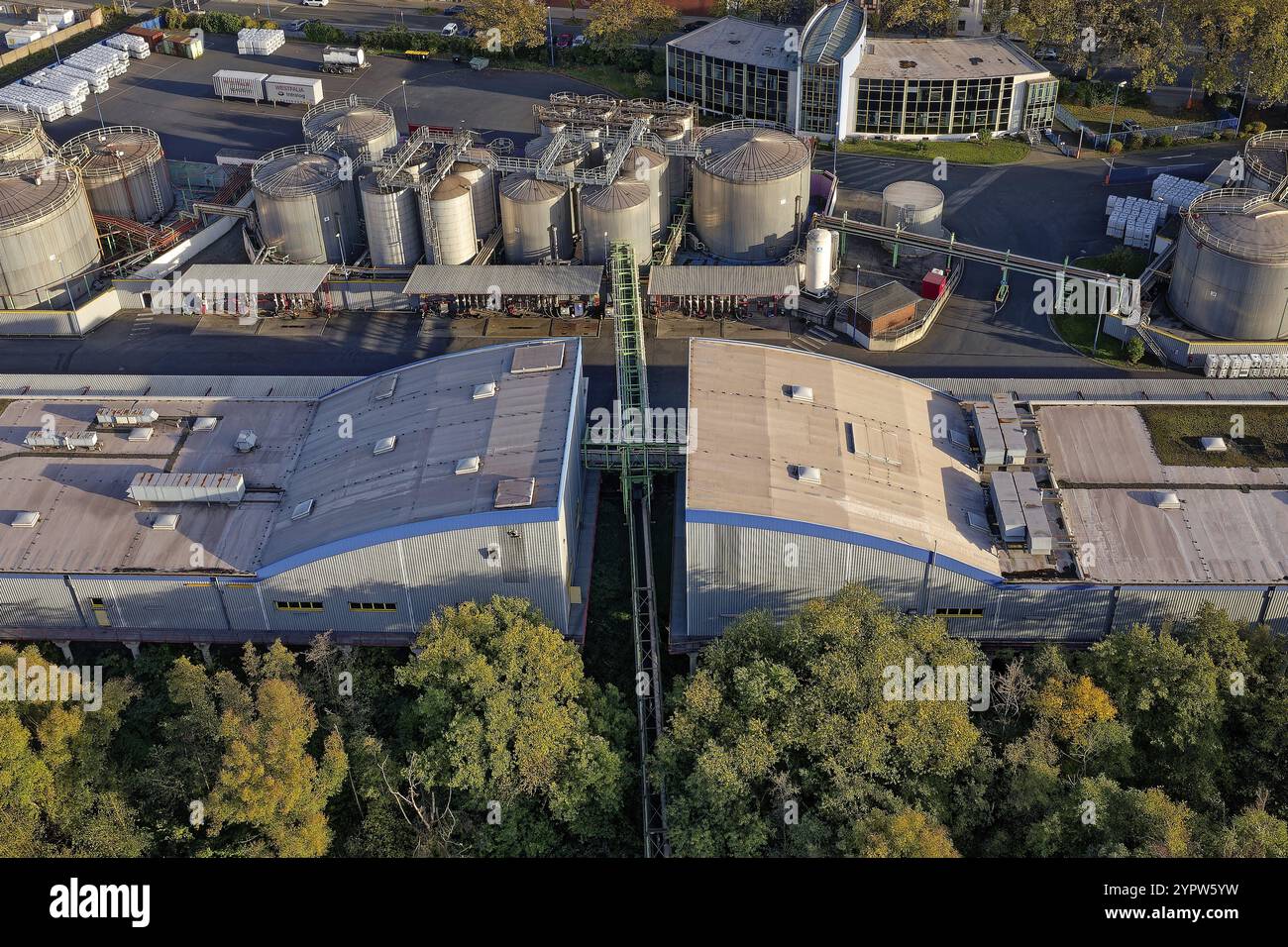 Stainless steel tanks storing chemicals at the Rhine river in Germany ...