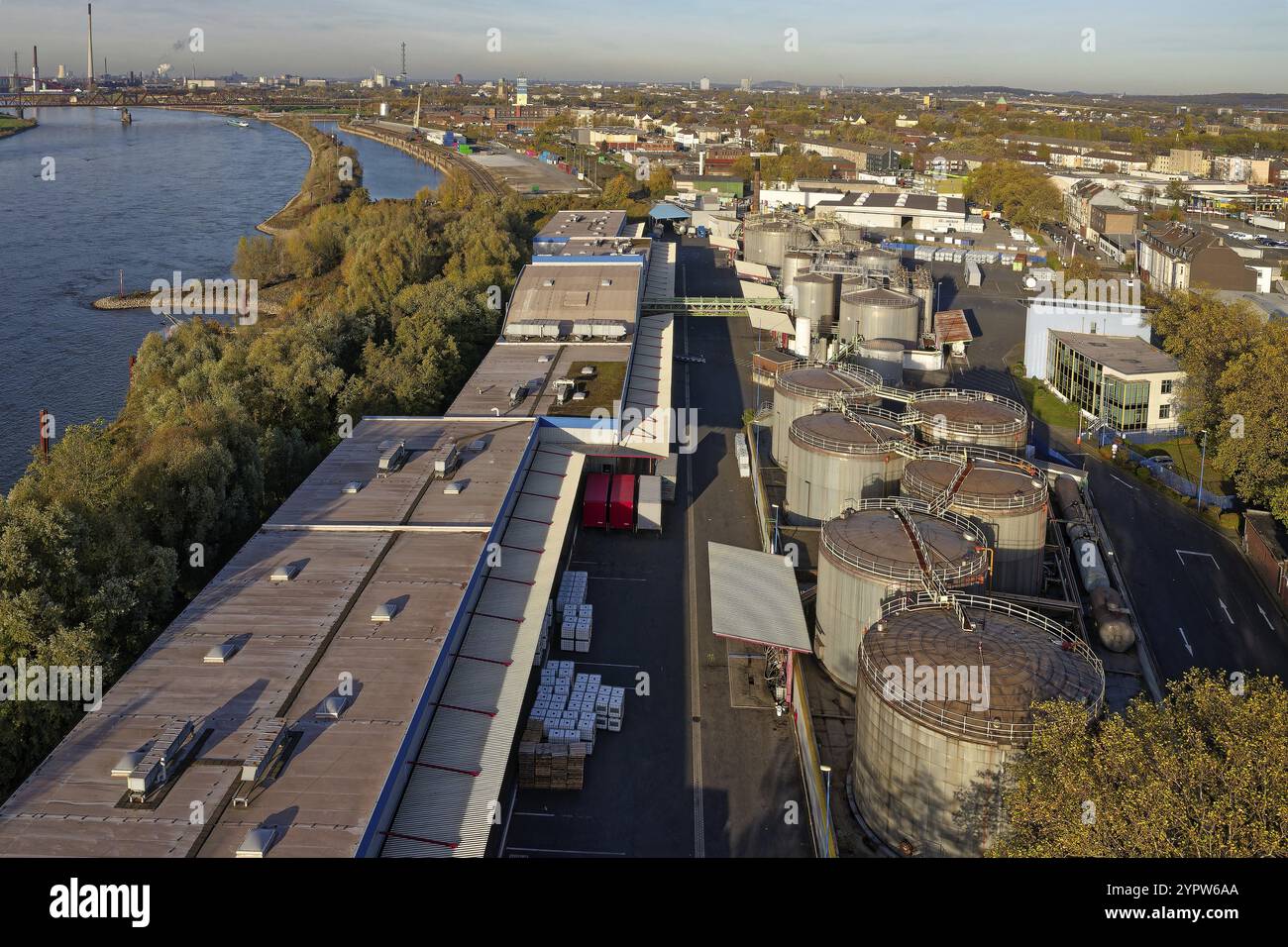 Stainless steel tanks storing chemicals at the Rhine river in Germany ...