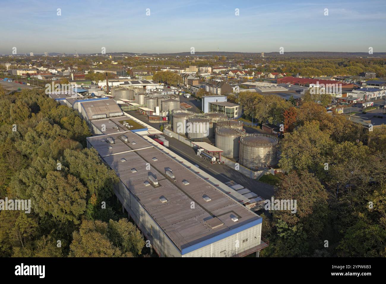 Stainless steel tanks storing chemicals at the Rhine river in Germany ...