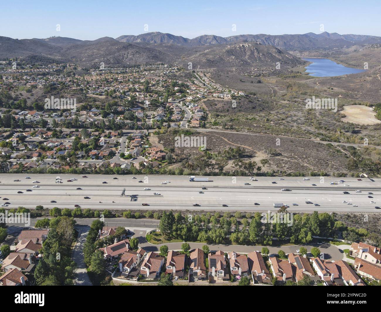 Aerial view of highway with traffic surrounded by houses, Interstate 15 ...