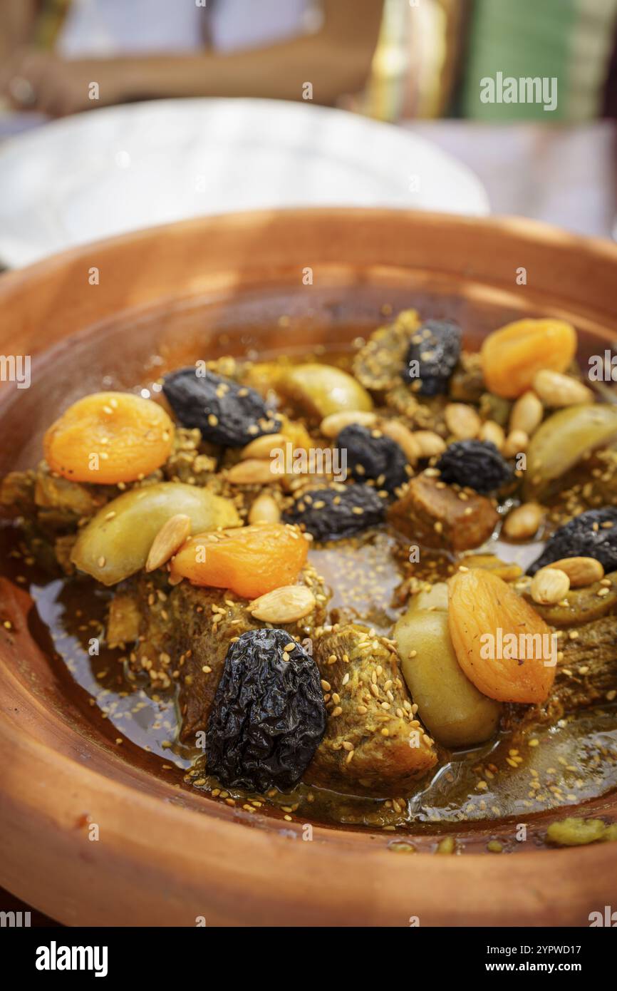 Beef tagine with pears, plums and almonds, Berbari Moroccan cuisine ...
