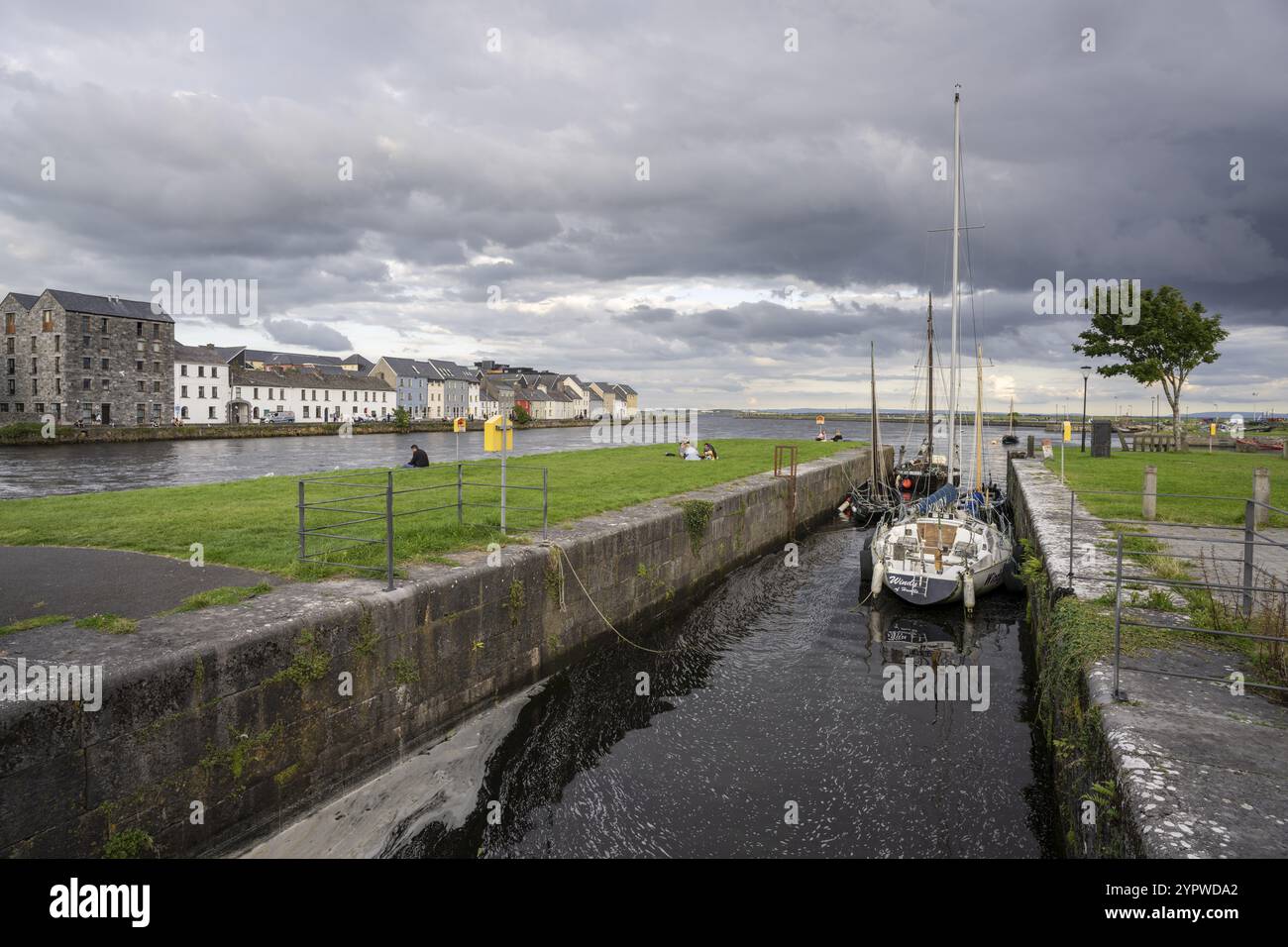 Boat anchored in Eglinton Canal Sea Lock, The Long Walk, Galway ...