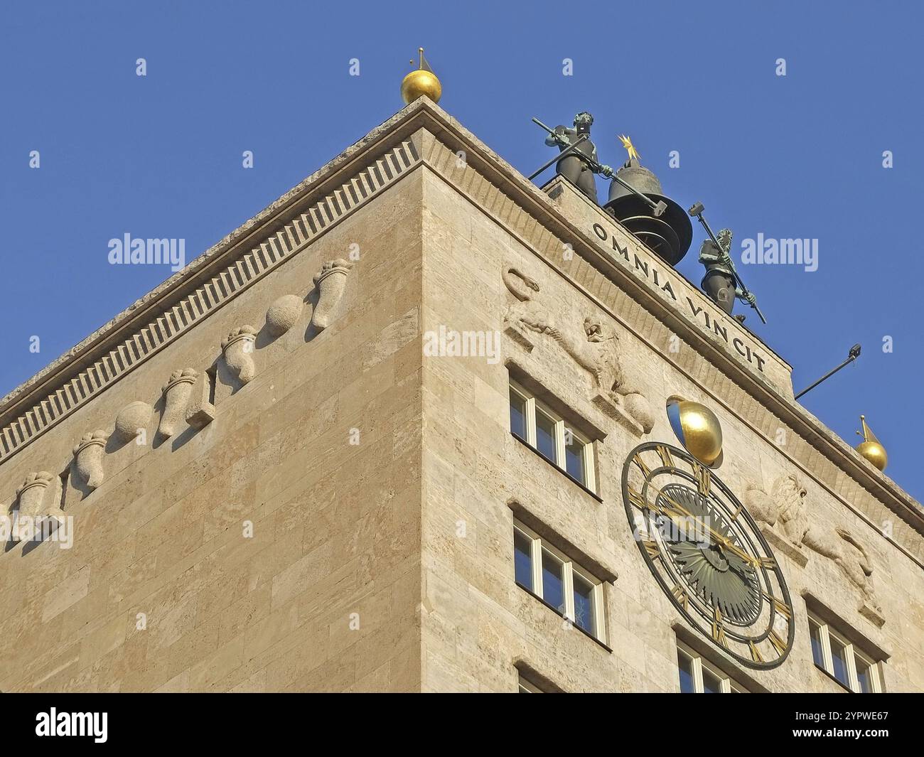 Roof ridge and bell men on the Kroch tower block. Augustusplatz Leipzig ...
