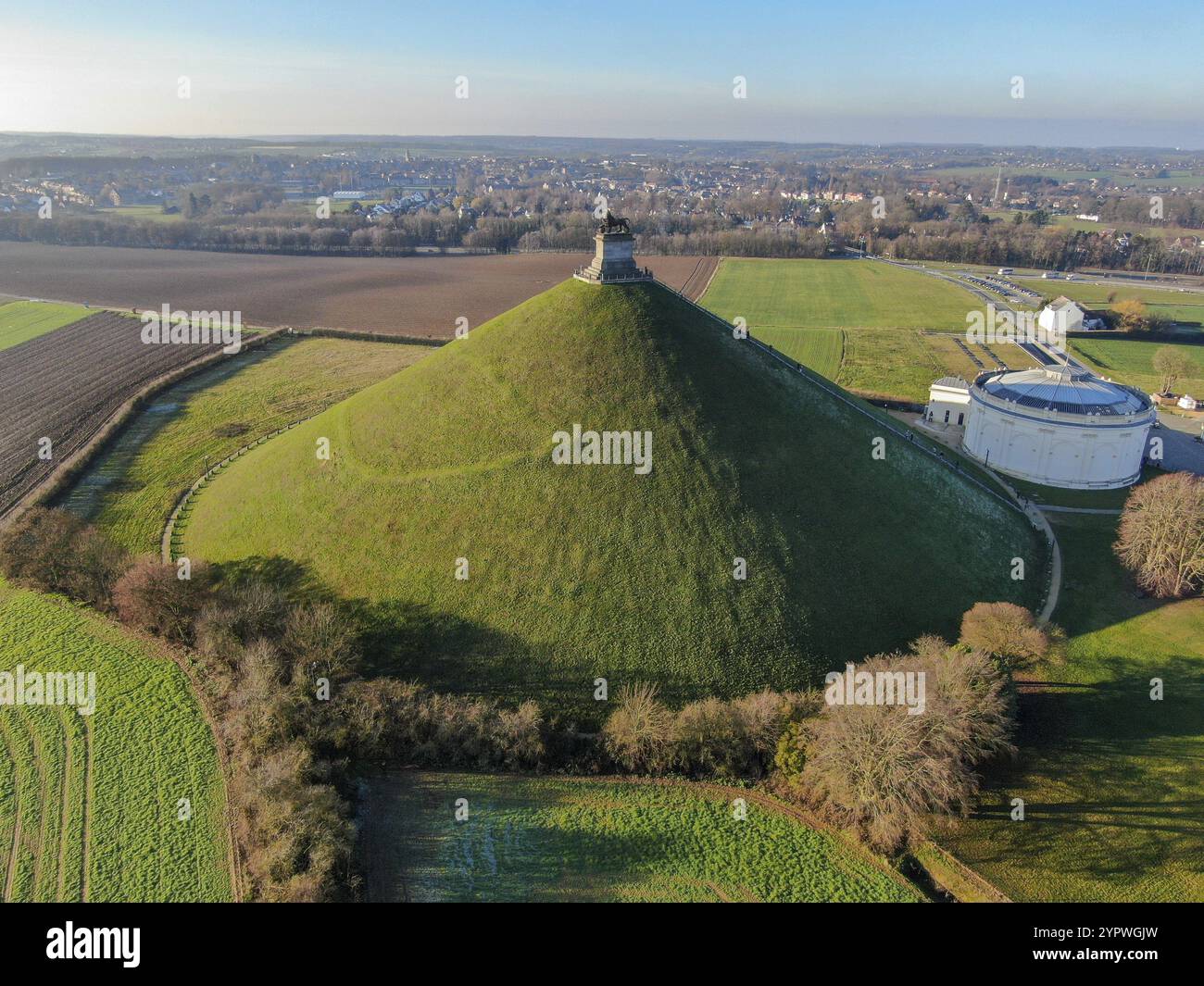 Aerial view of The Lion's Mound with farm land around. The immense ...